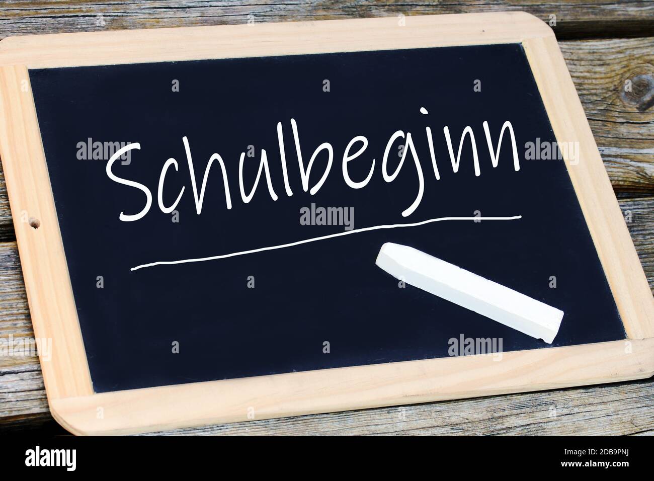 On a blackboard the start of school is written. School starts again ...