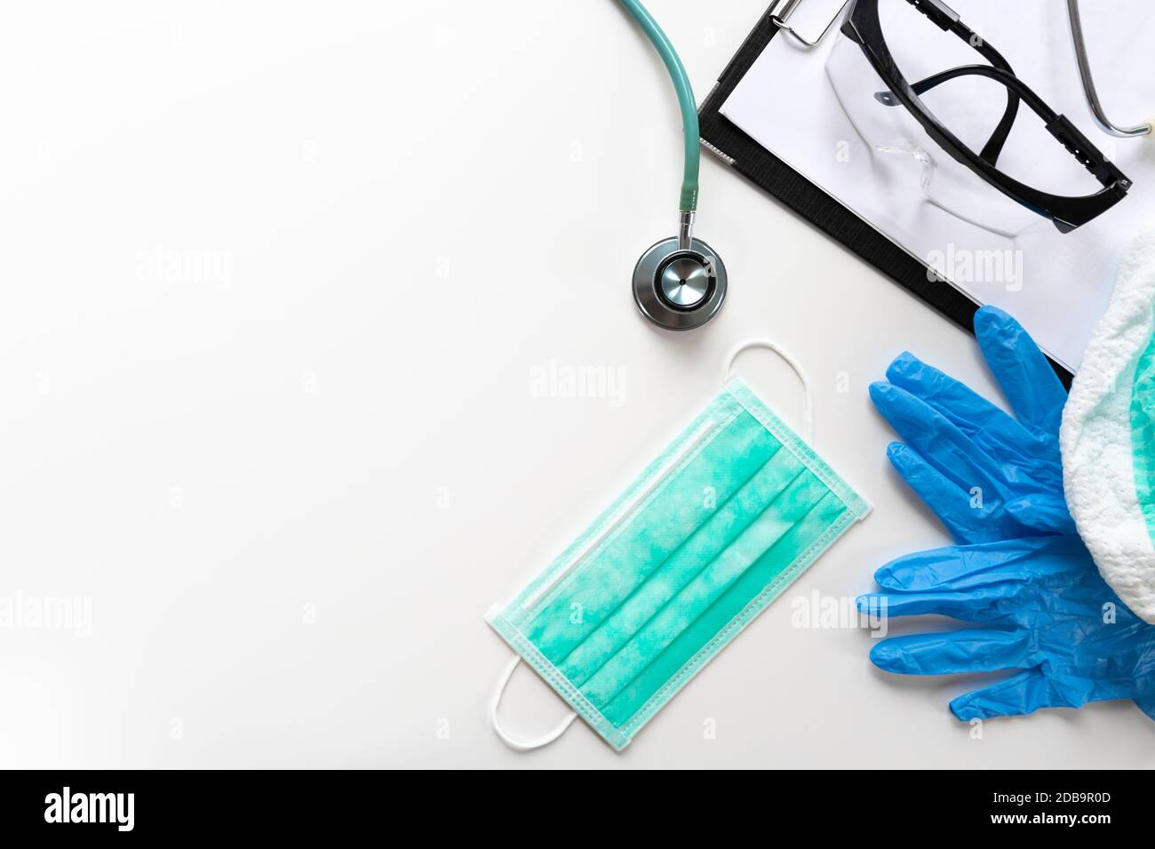Doctors and nurses protection kit on a white table, top view Stock ...