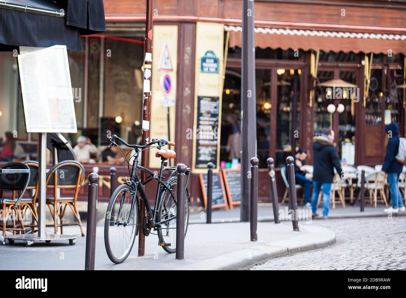 Bicycle parked at a corner on the famous neighborhood of Montmartre in ...