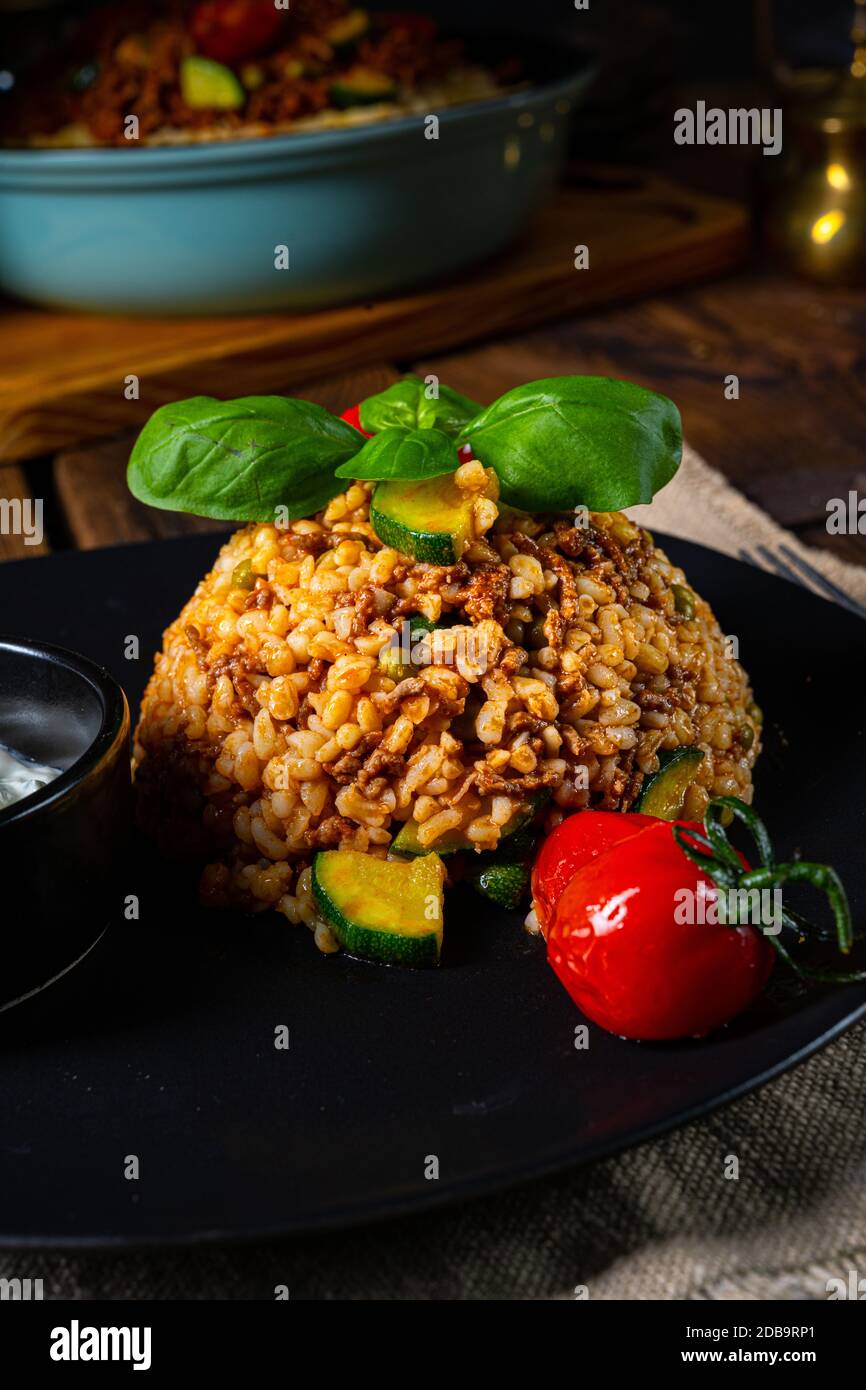 rustic bulgur fried with minced meat and vegetables Stock Photo - Alamy