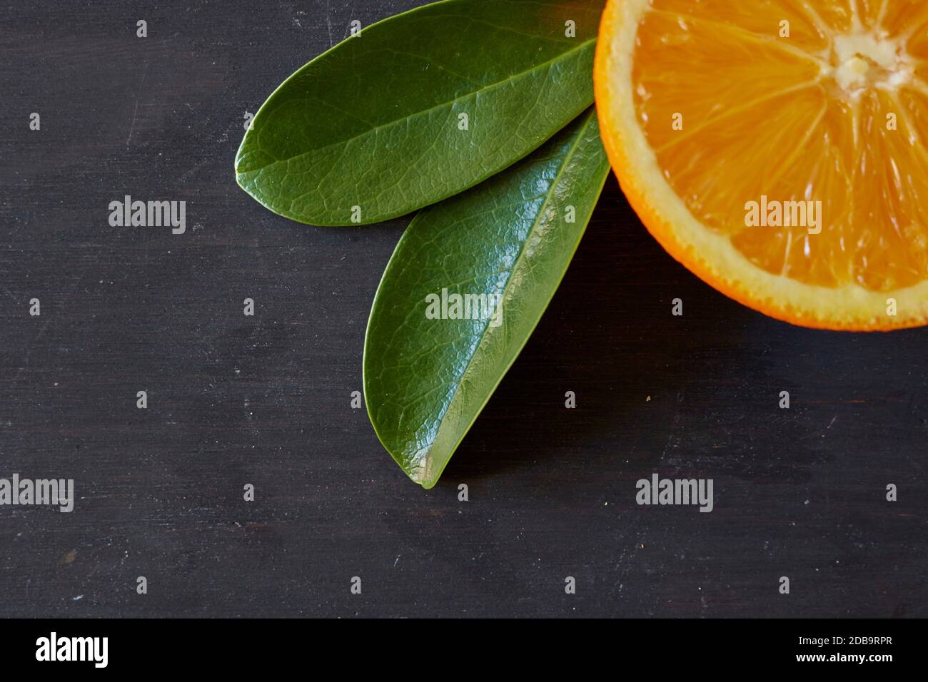 A studio photo of orange fruit Leaves Stock Photo - Alamy