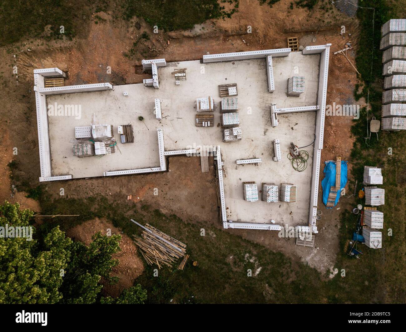 Aerial image of a new family house being built. New private housing ...