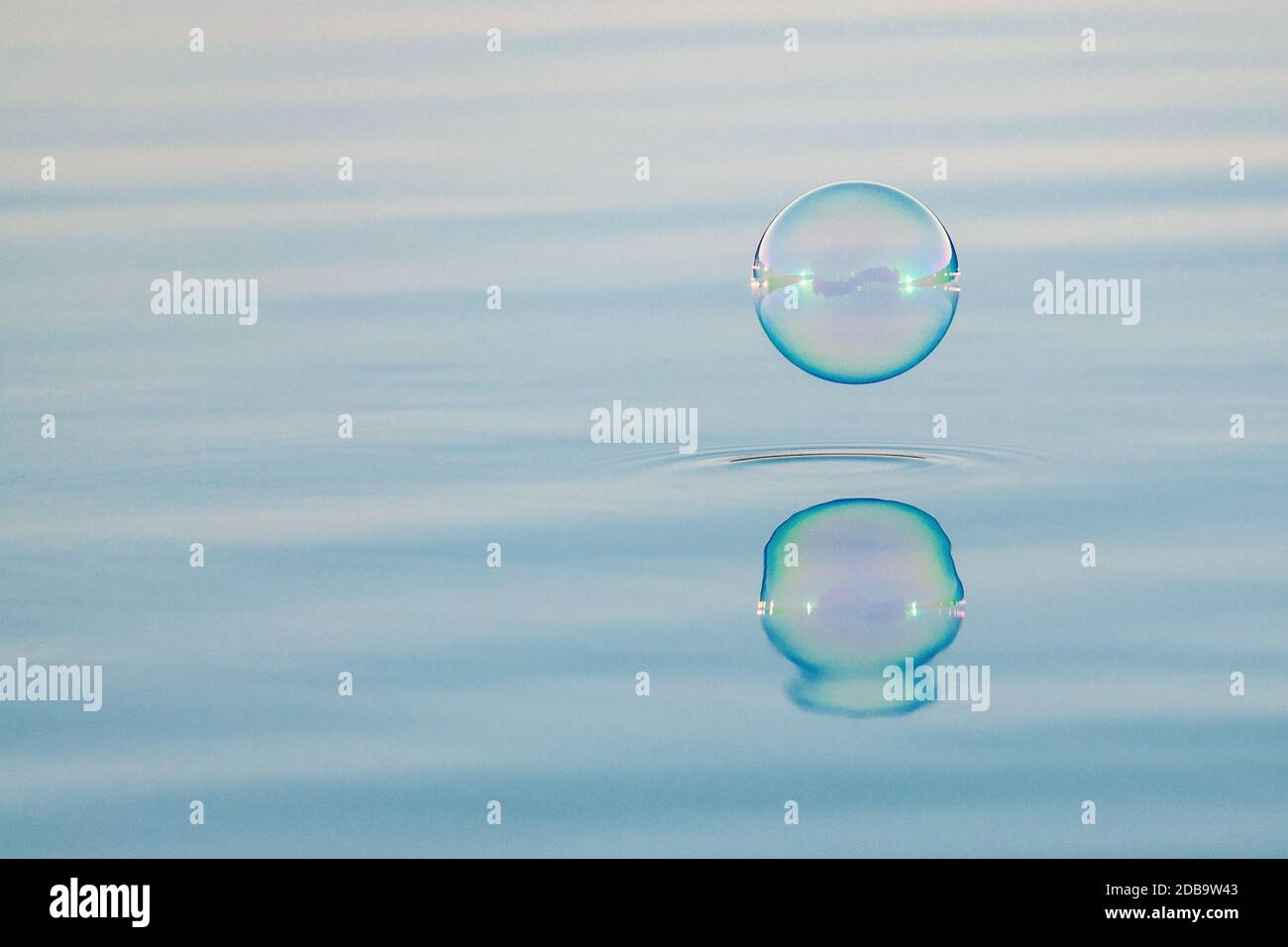 background with water surface and bubble bouncing off it Stock Photo ...