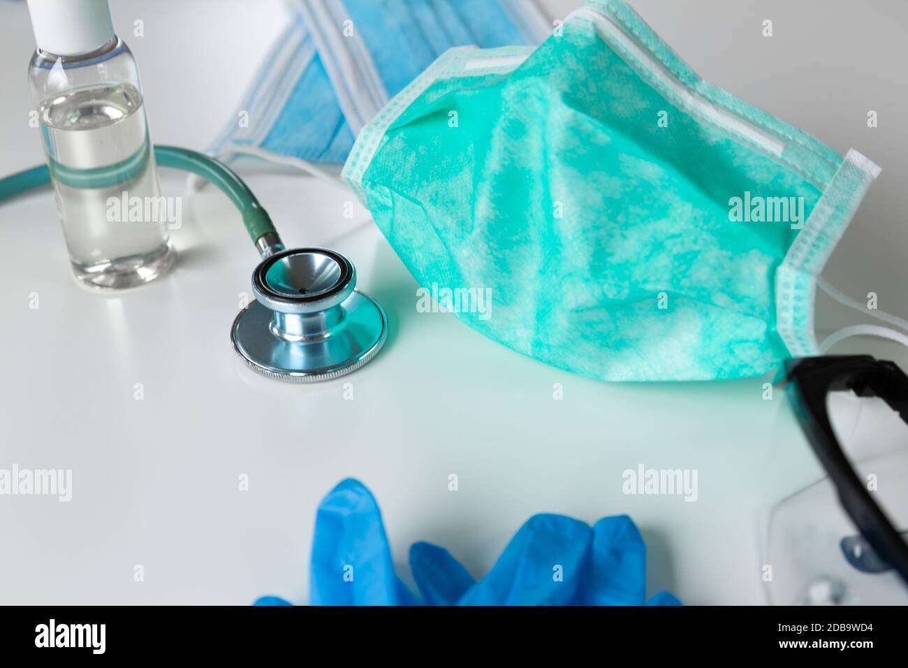 Doctors and nurses protection kit on a lue background, top view Stock ...