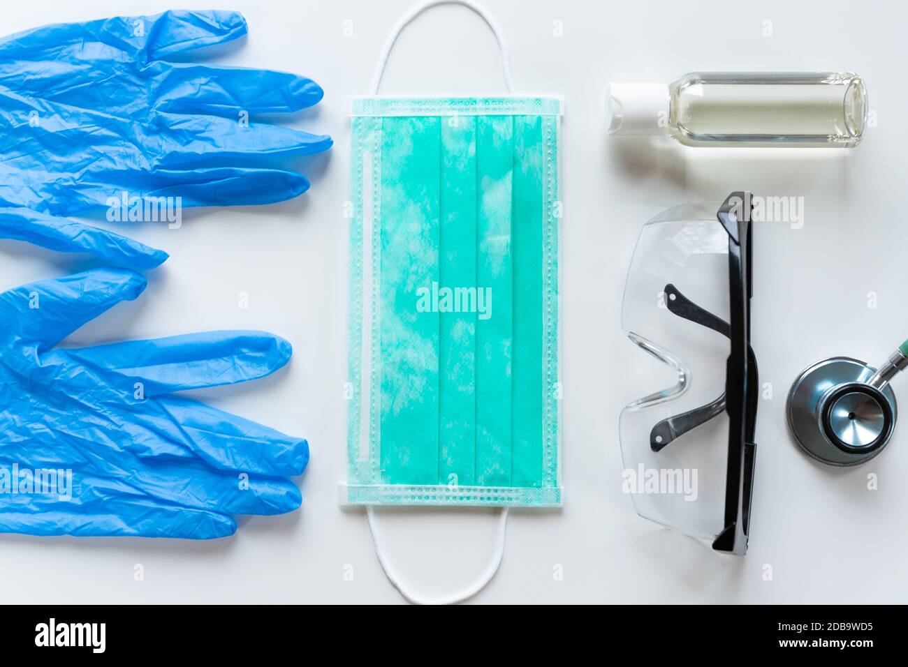 Doctors and nurses protection kit on a lue background, top view Stock ...