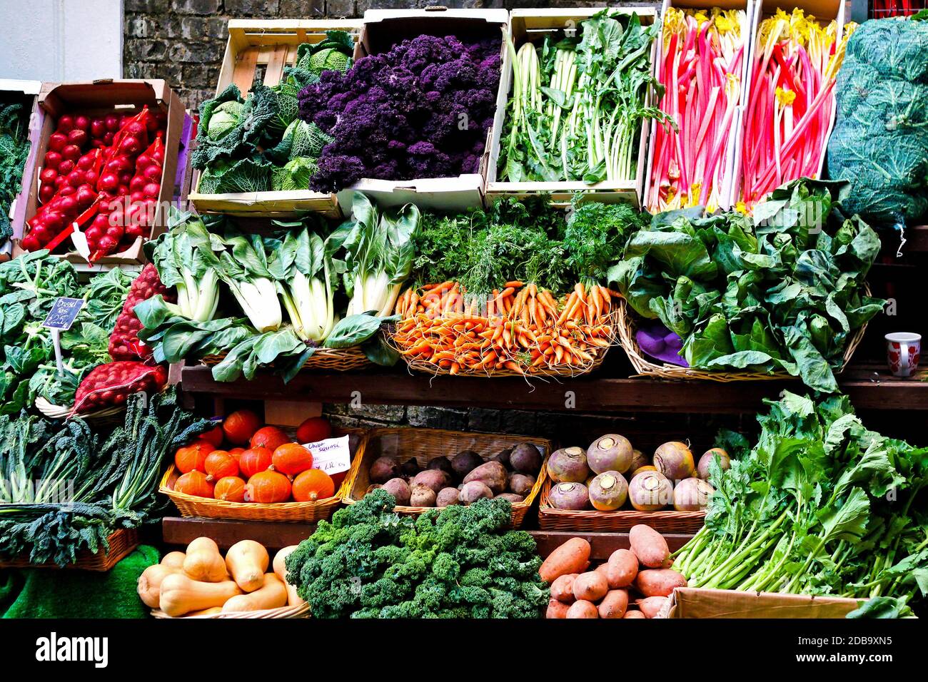 Fresh vegetables sold on nicely arranged market stall Stock Photo - Alamy