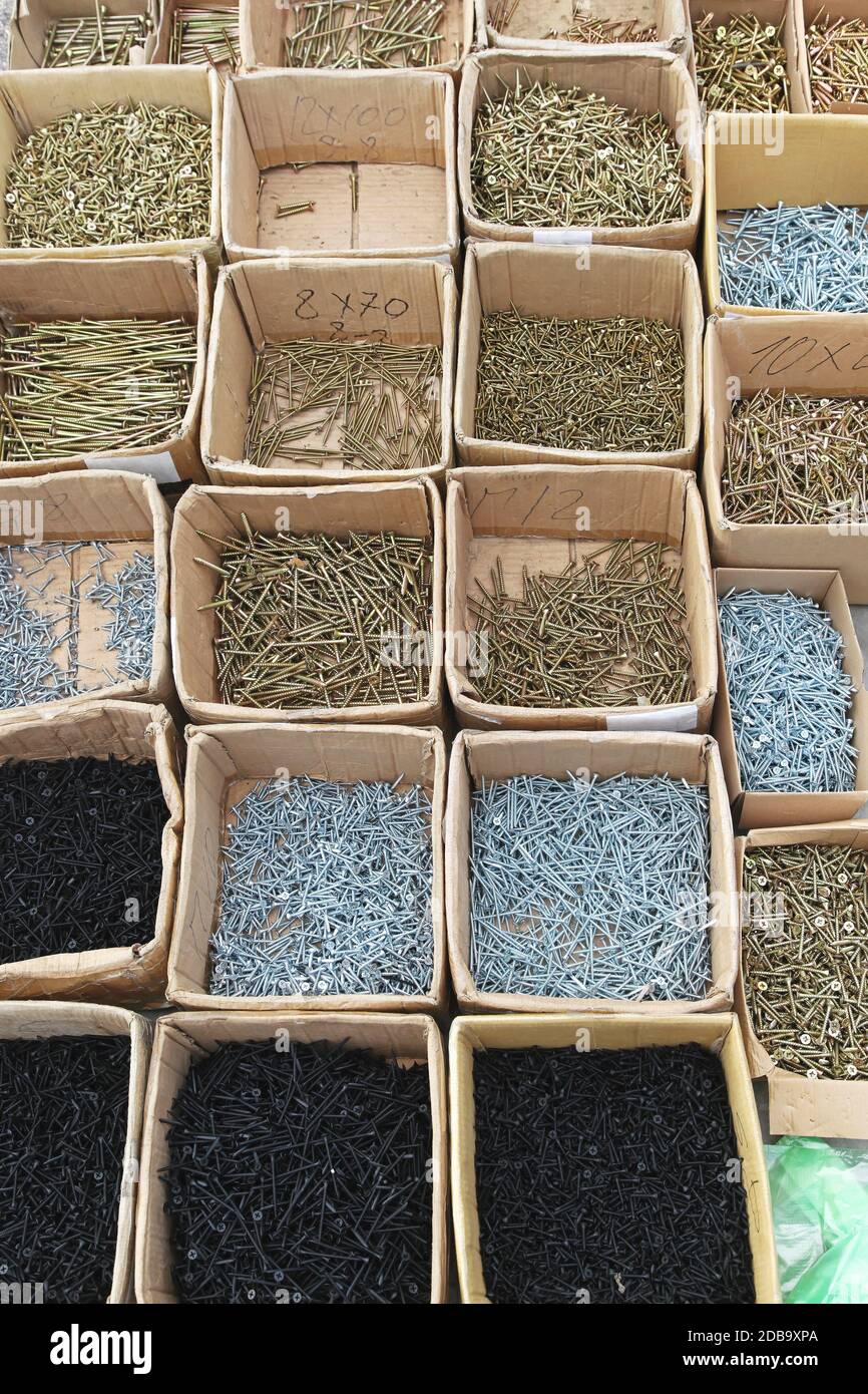 Boxes of screws for wood in hardware shop Stock Photo - Alamy