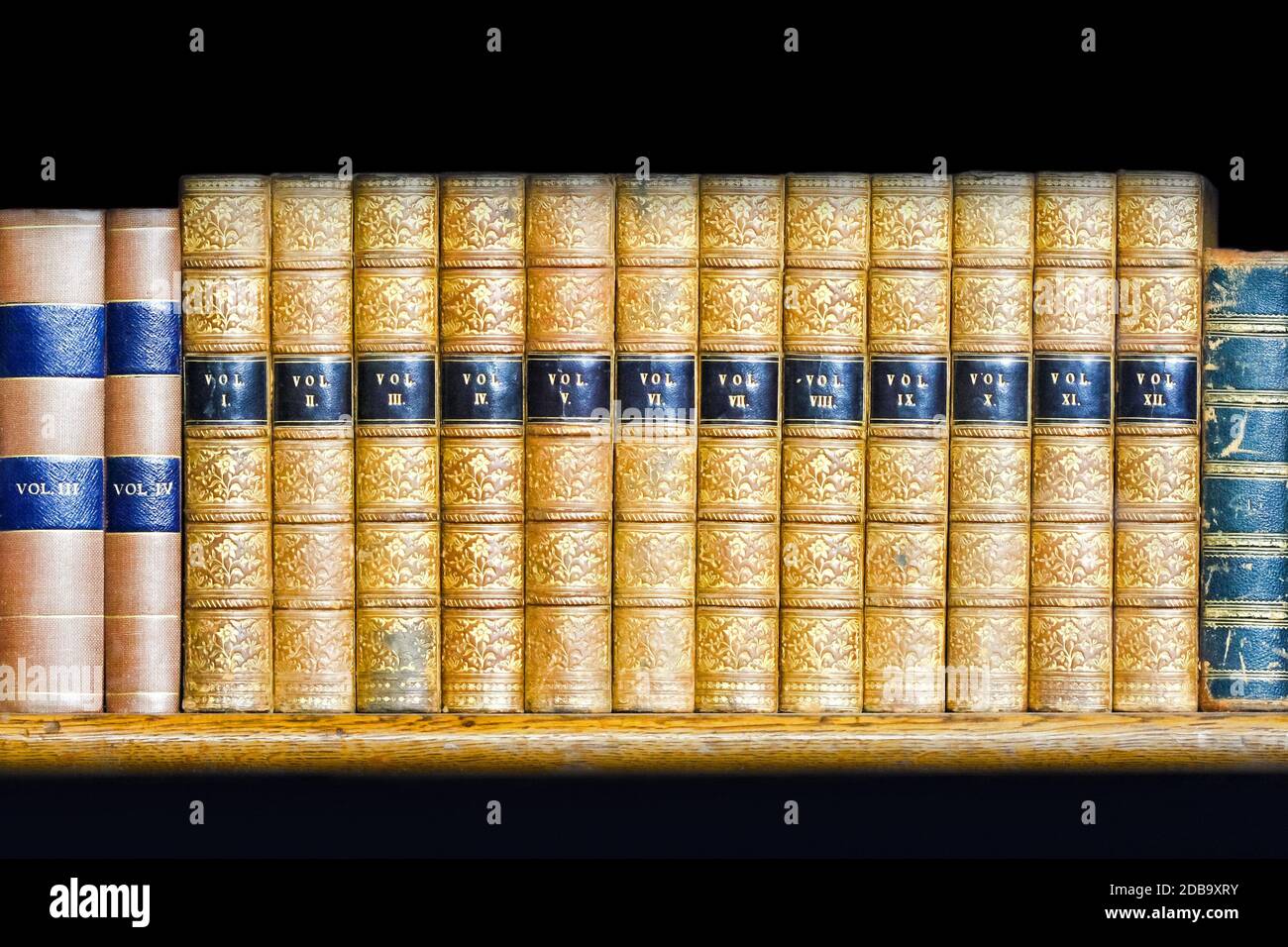 Large volume of old books at shelf Stock Photo - Alamy