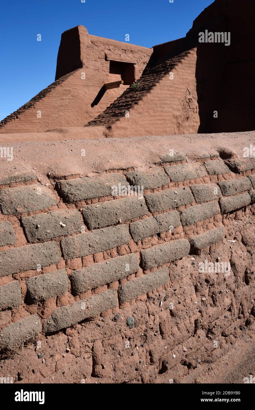 The adobe ruins of a Spanish 17th century mission church at Pecos ...