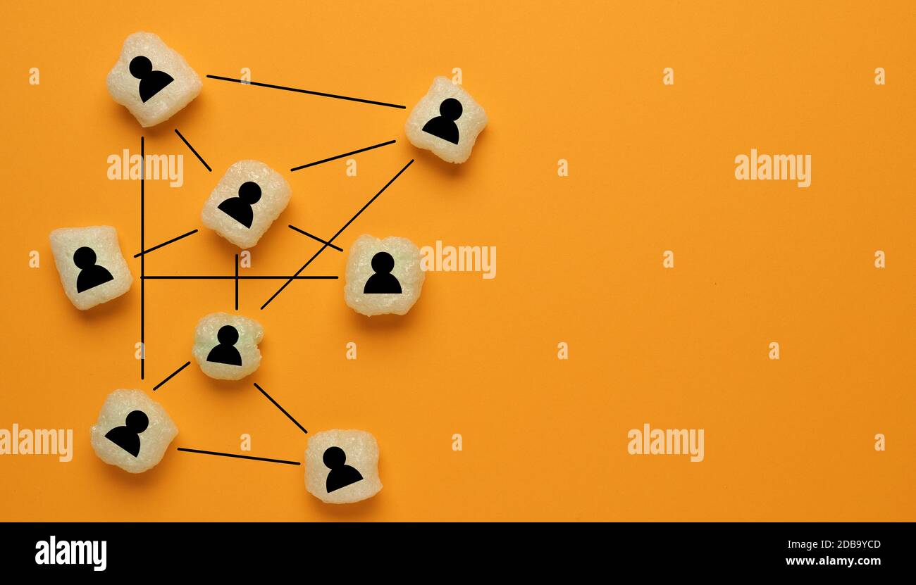 Abstract teamwork, network and community concept on an orange paper ...