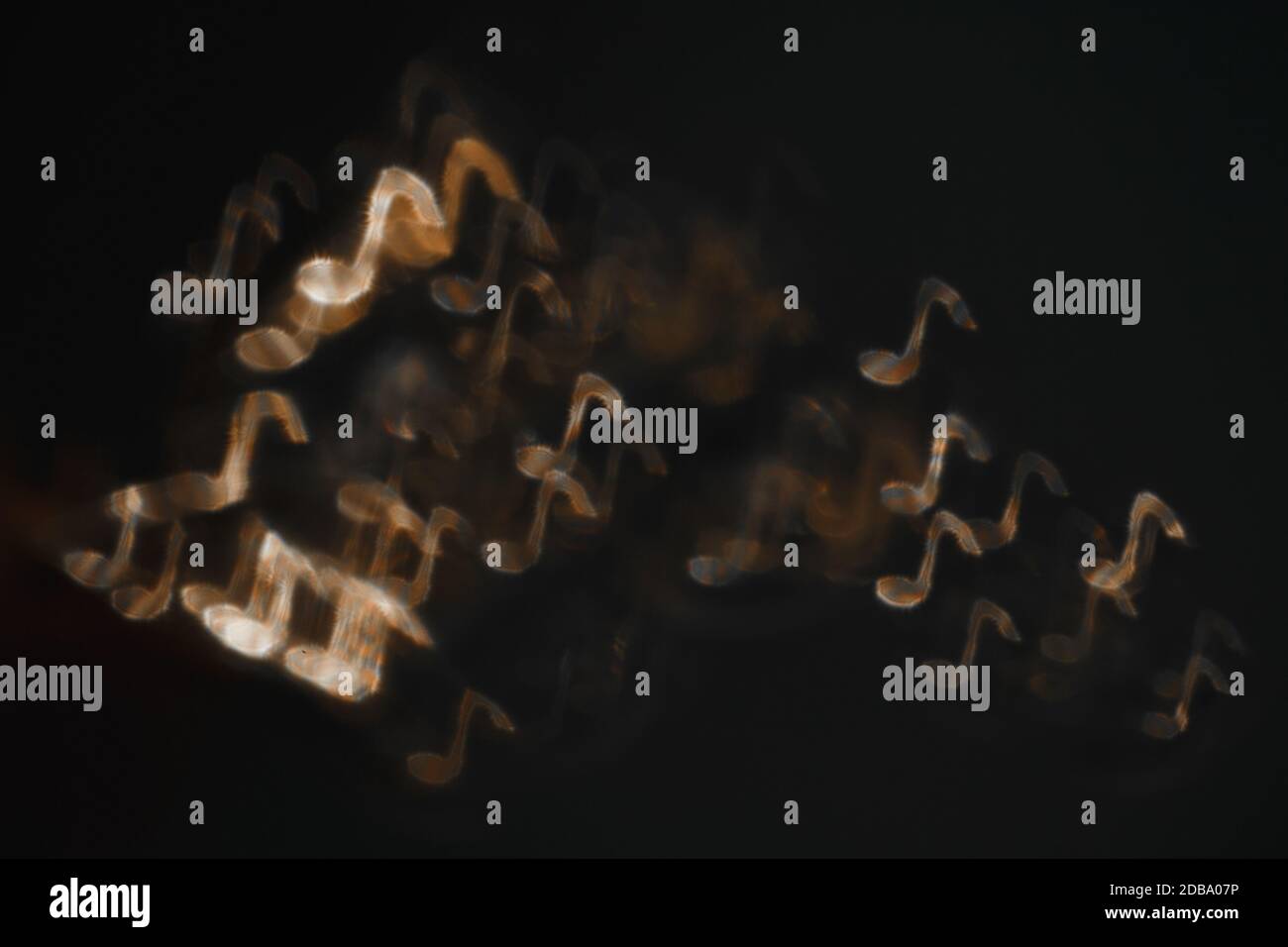 Gold notes on black background Stock Photo - Alamy