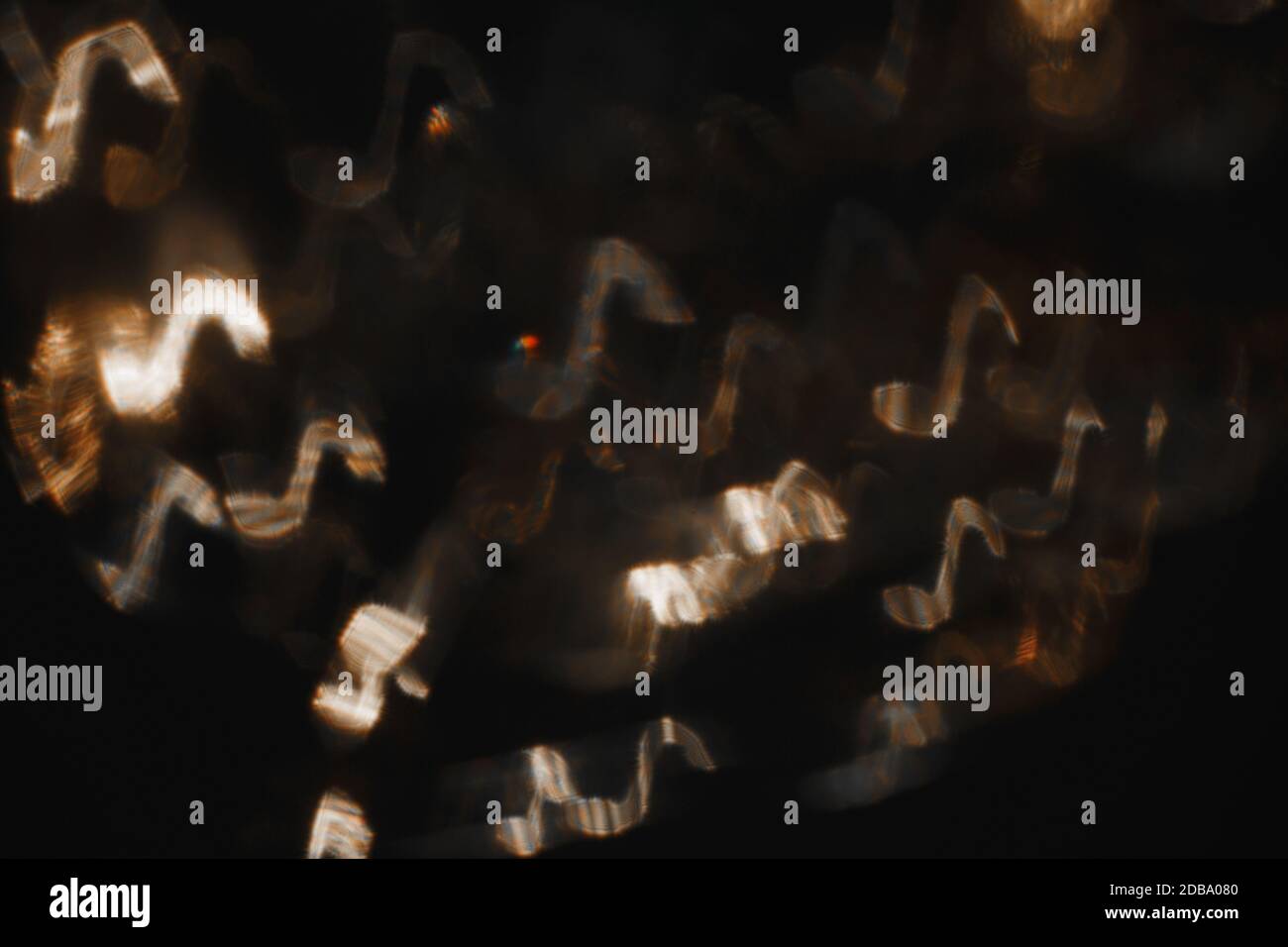 Gold notes on black background Stock Photo - Alamy