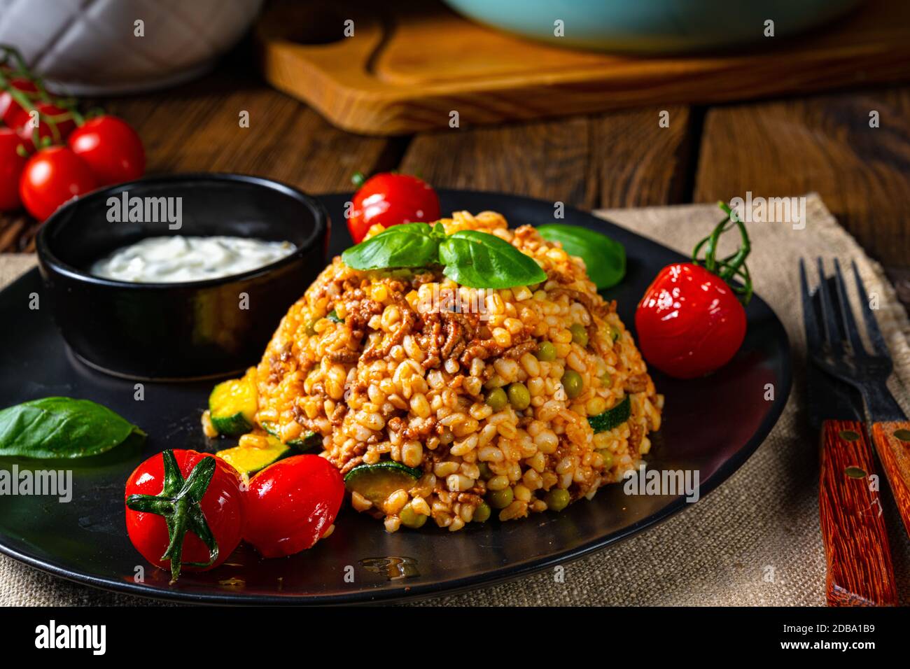 rustic bulgur fried with minced meat and vegetables Stock Photo - Alamy