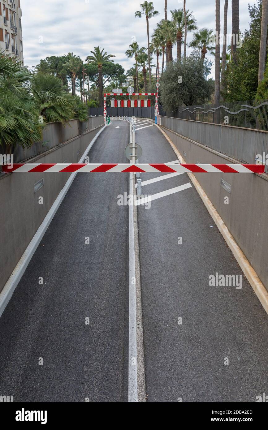 Two way road to underground parking garage in city hi-res stock ...