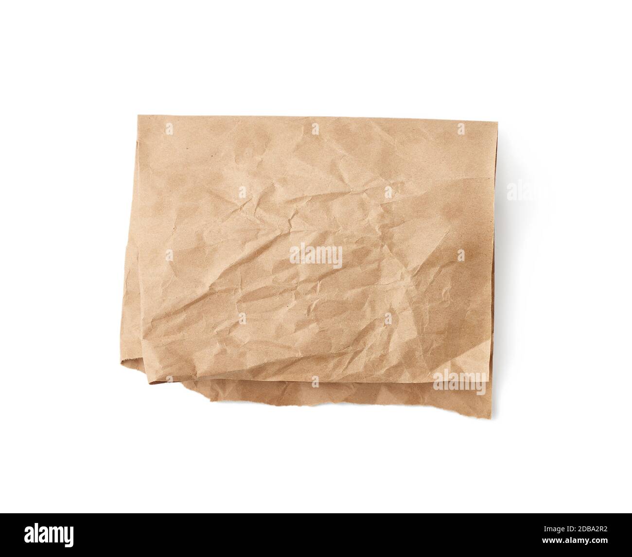 folded sheet of brown crumpled paper isolated on white background, top ...