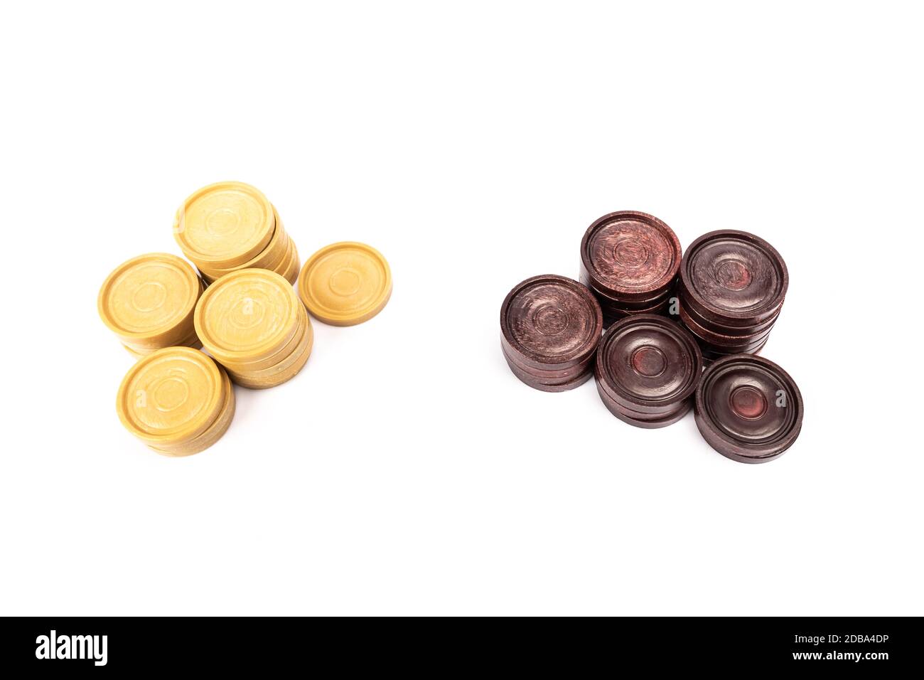 low-end plastic round checkers piece in white background in studio ...