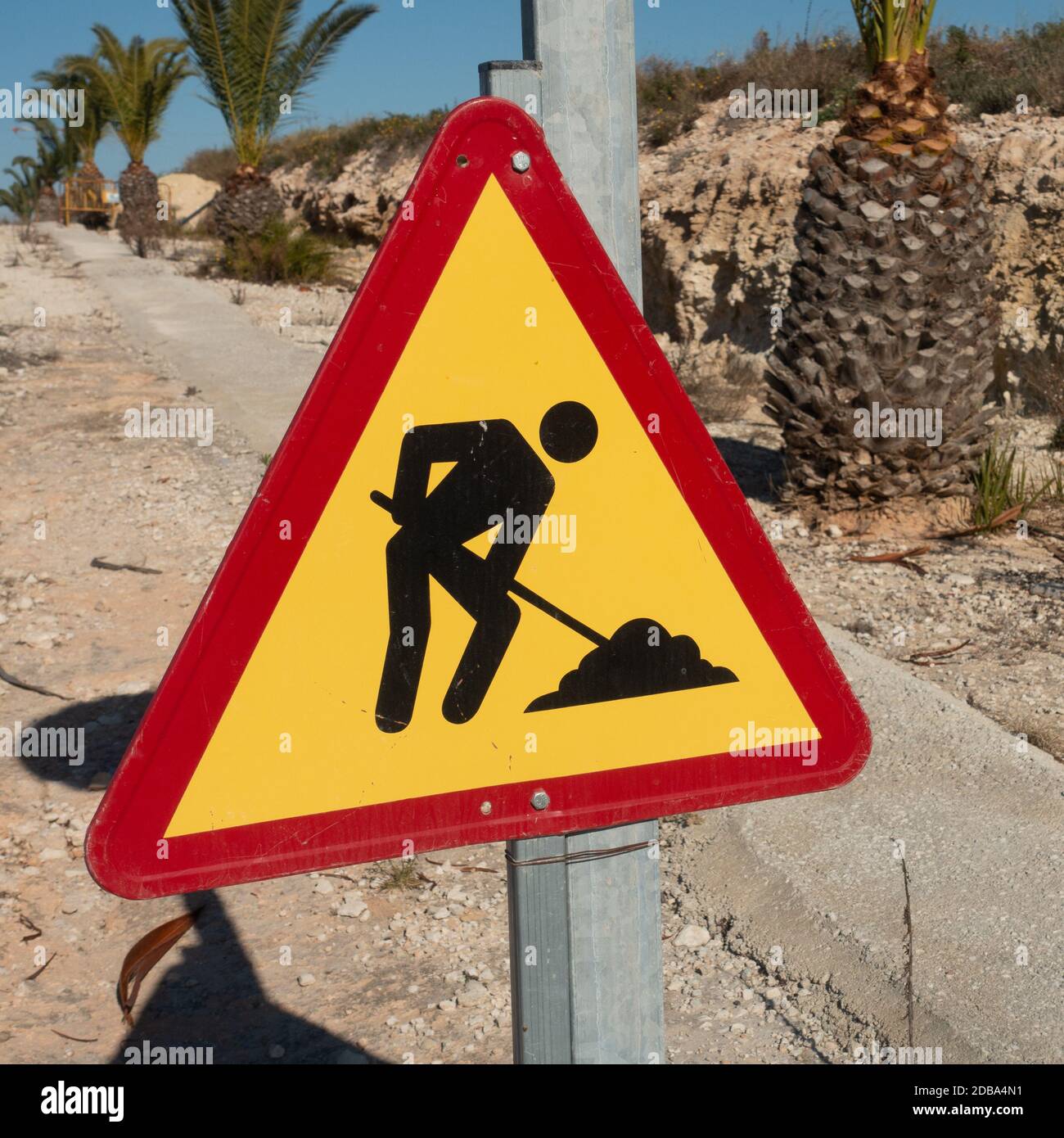 spanish warning road sign for men at work Stock Photo - Alamy