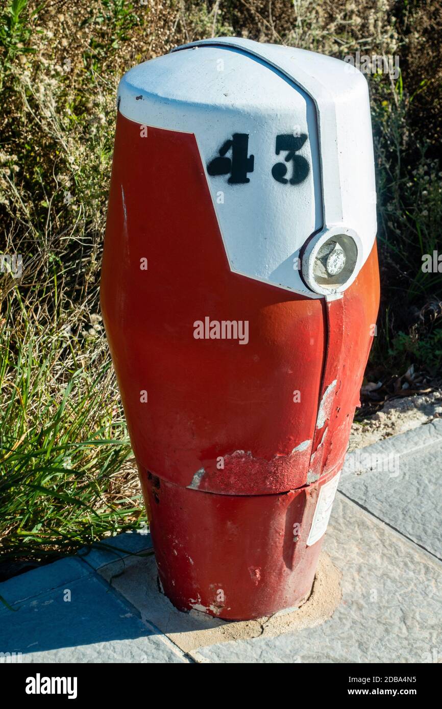 spanish fire hydrant at roadside on urbanisation Stock Photo - Alamy