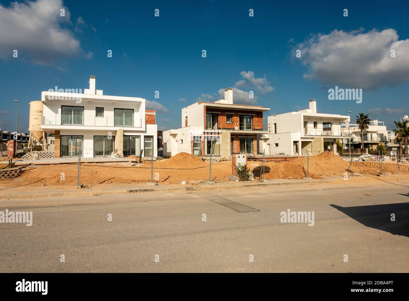 more new houses being built on spanish urbanisation Stock Photo - Alamy