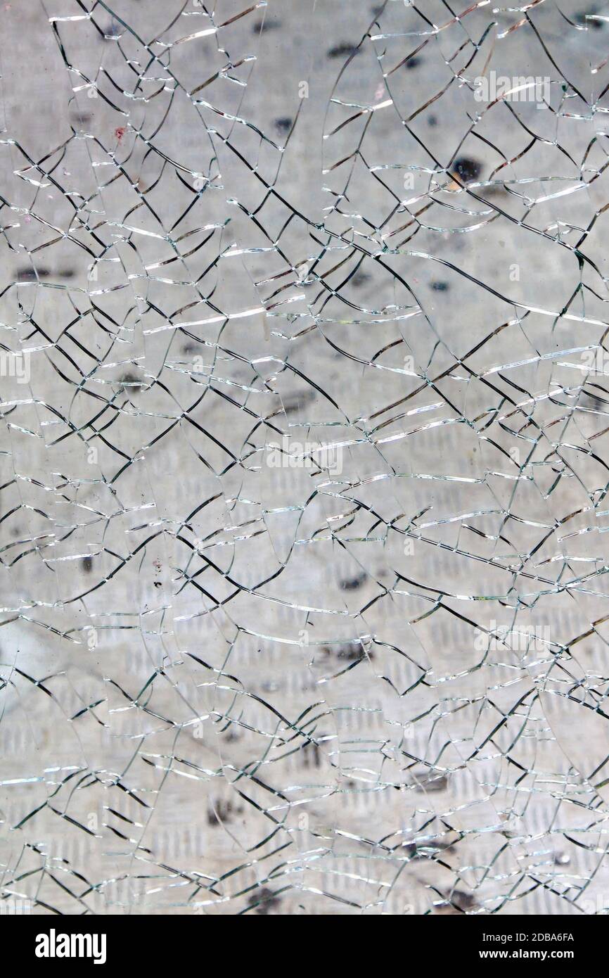 Detailed texture of transparent broken glass with cracks Stock Photo ...