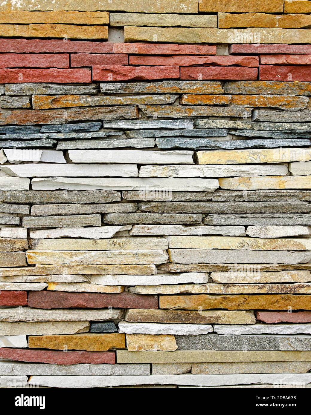 Background image of wall made of natural stone tiles hi-res stock ...