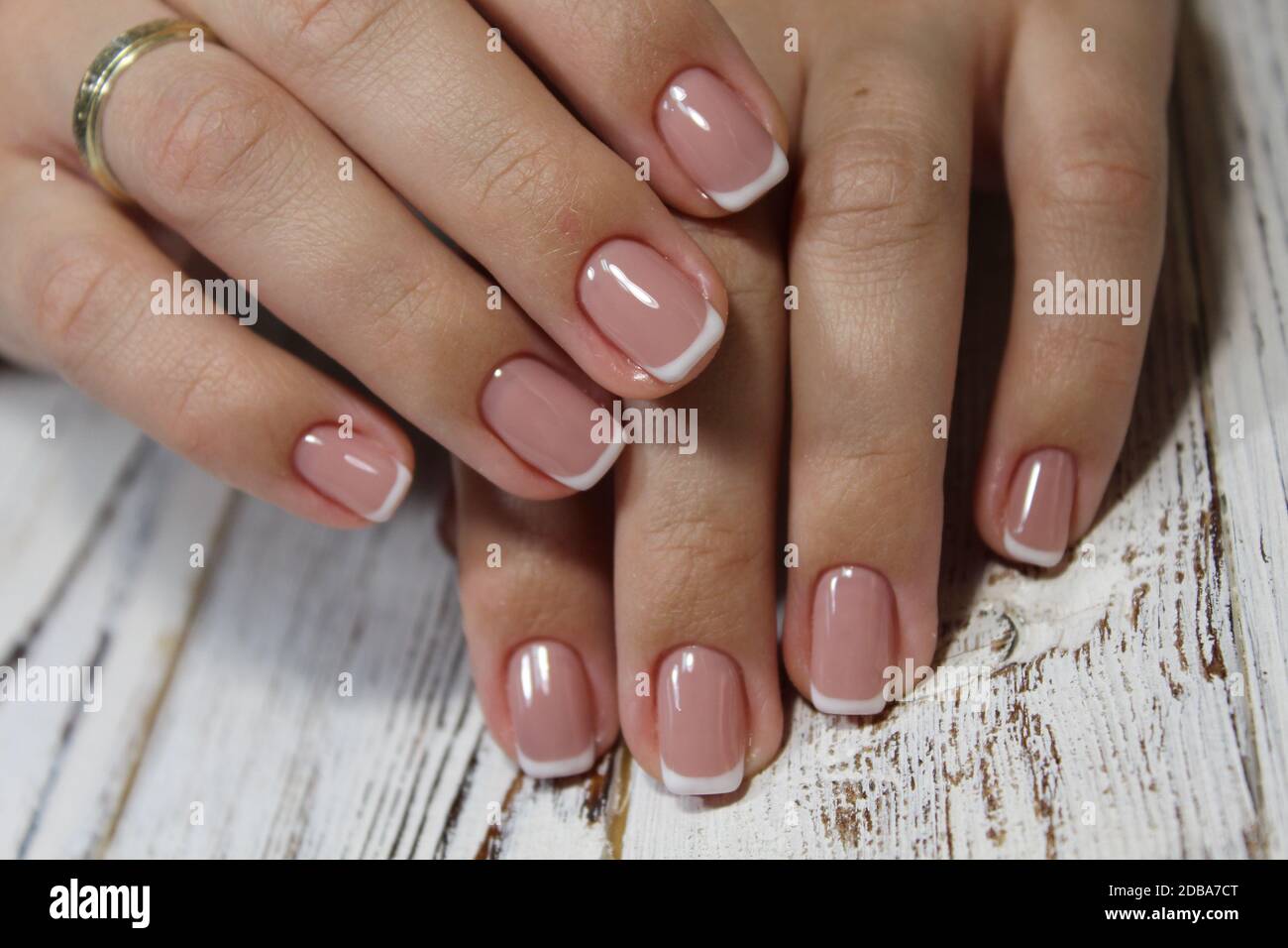 beautiful French manicure on a trendy texture background Stock Photo ...
