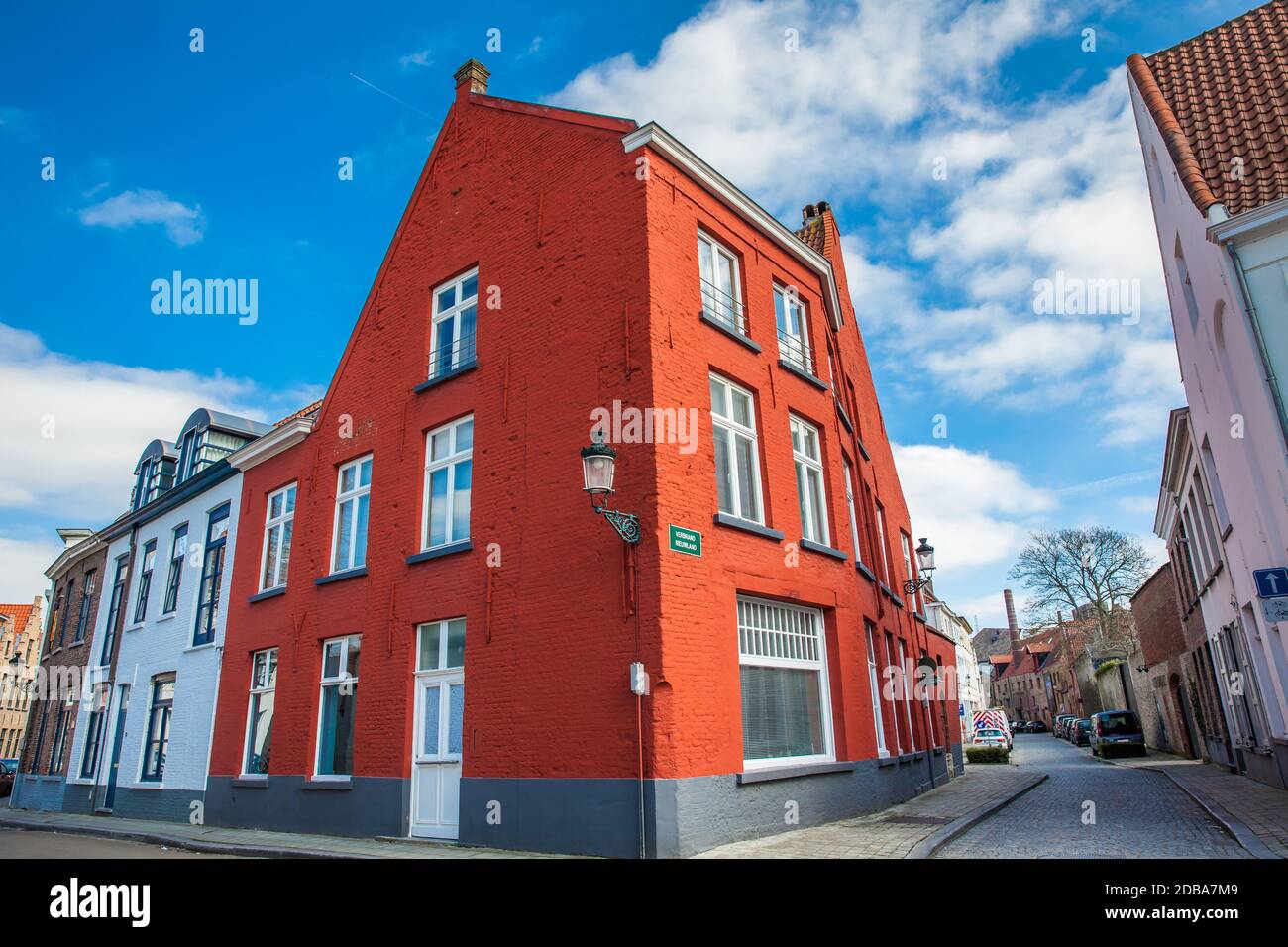 BRUGES, BELGIUM - MARCH, 2018: Red house and the beautiful streets of ...