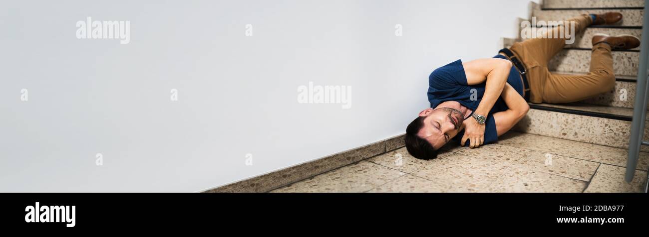 Slip And Fall Accident On Stairs. Worker Man Fallen Down Stock Photo ...
