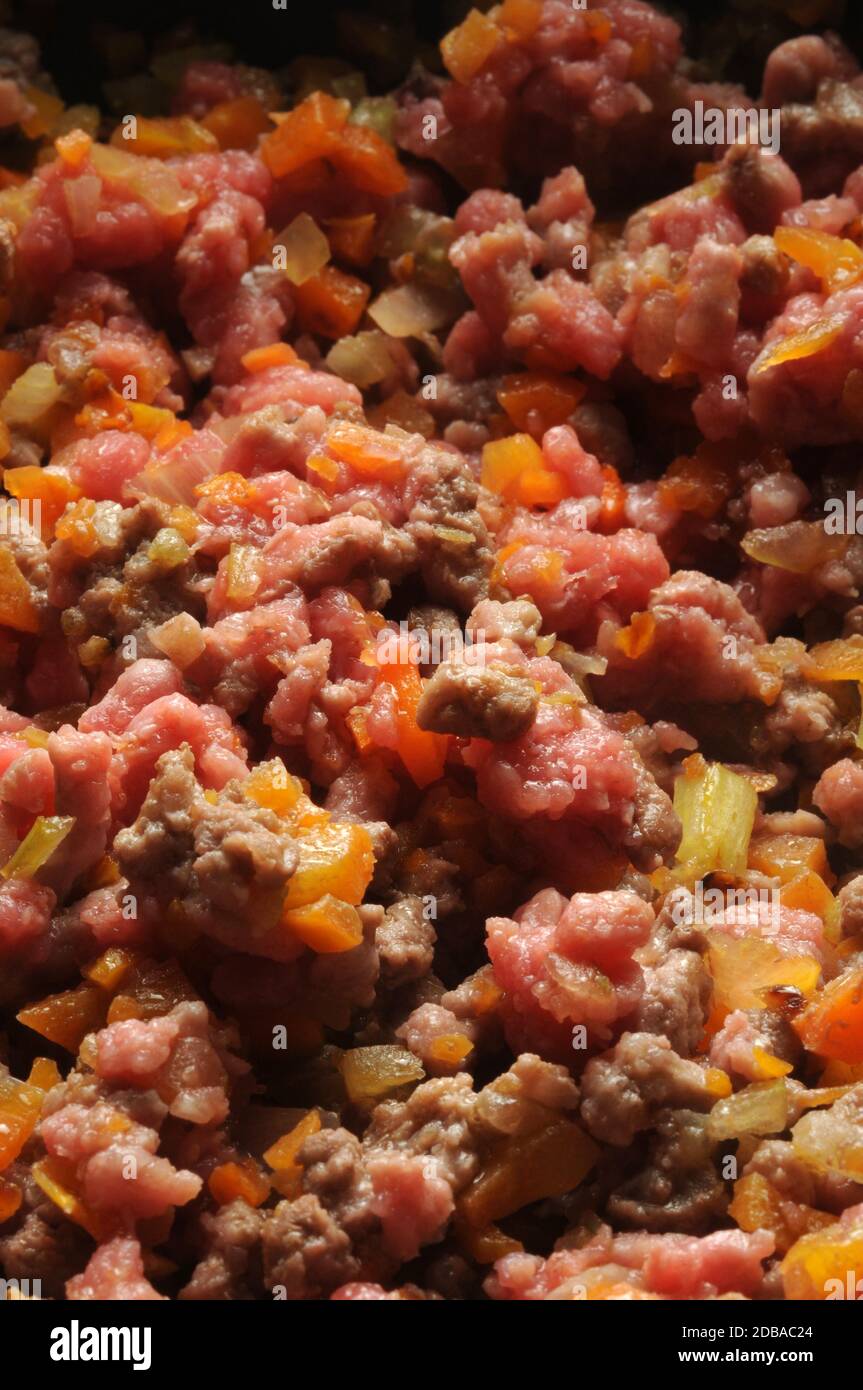 Cooking minced meat with vegetables for the sauce Stock Photo - Alamy