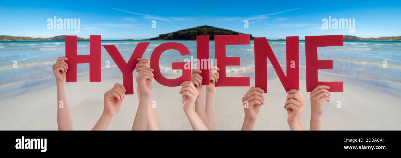 People Hands Holding Red English Word Hygiene. Ocean And Beach As ...