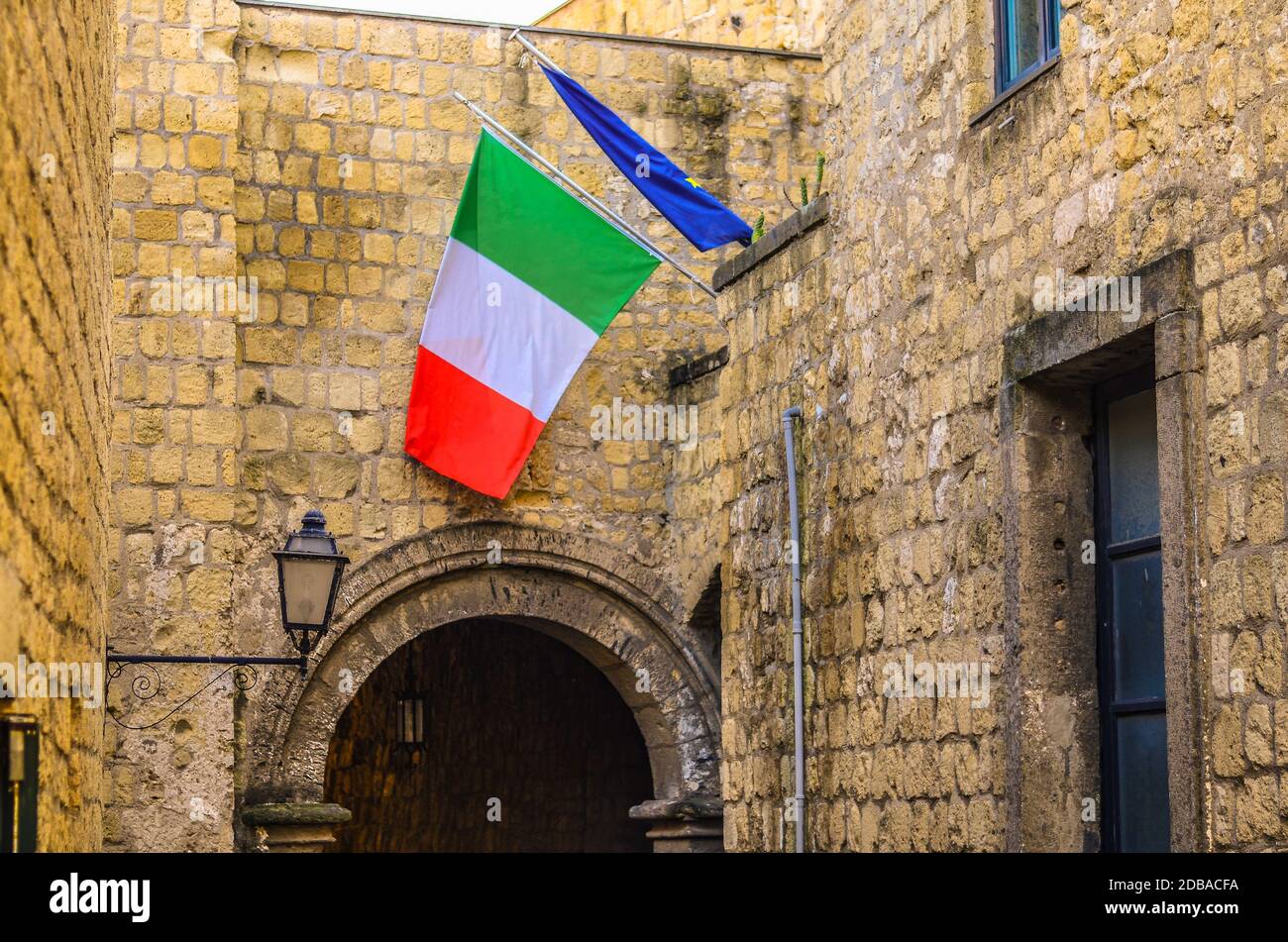 National italian flag on the facade of old house building Stock Photo ...