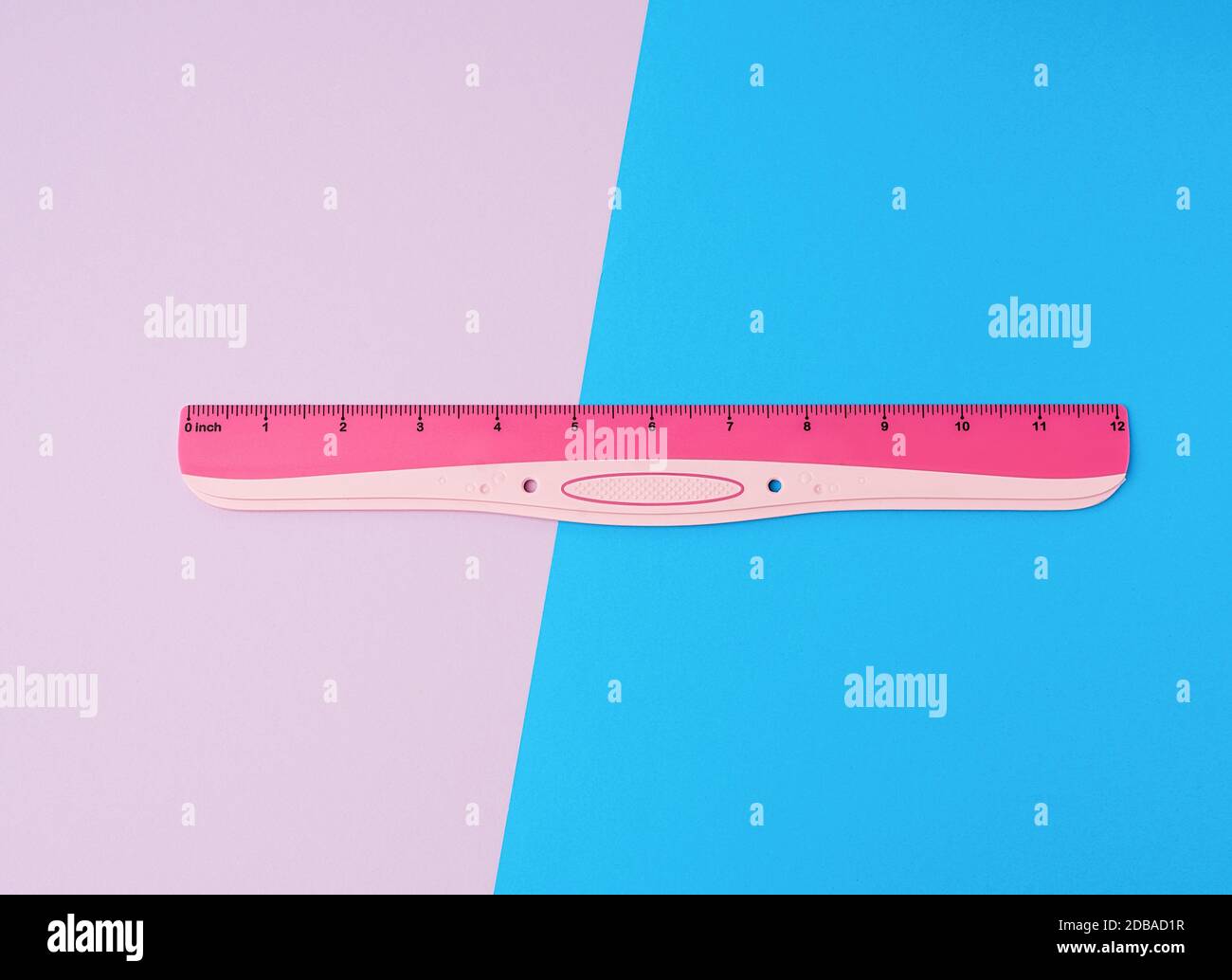 pink plastic ruler on a colored background, top view, flat lay Stock ...