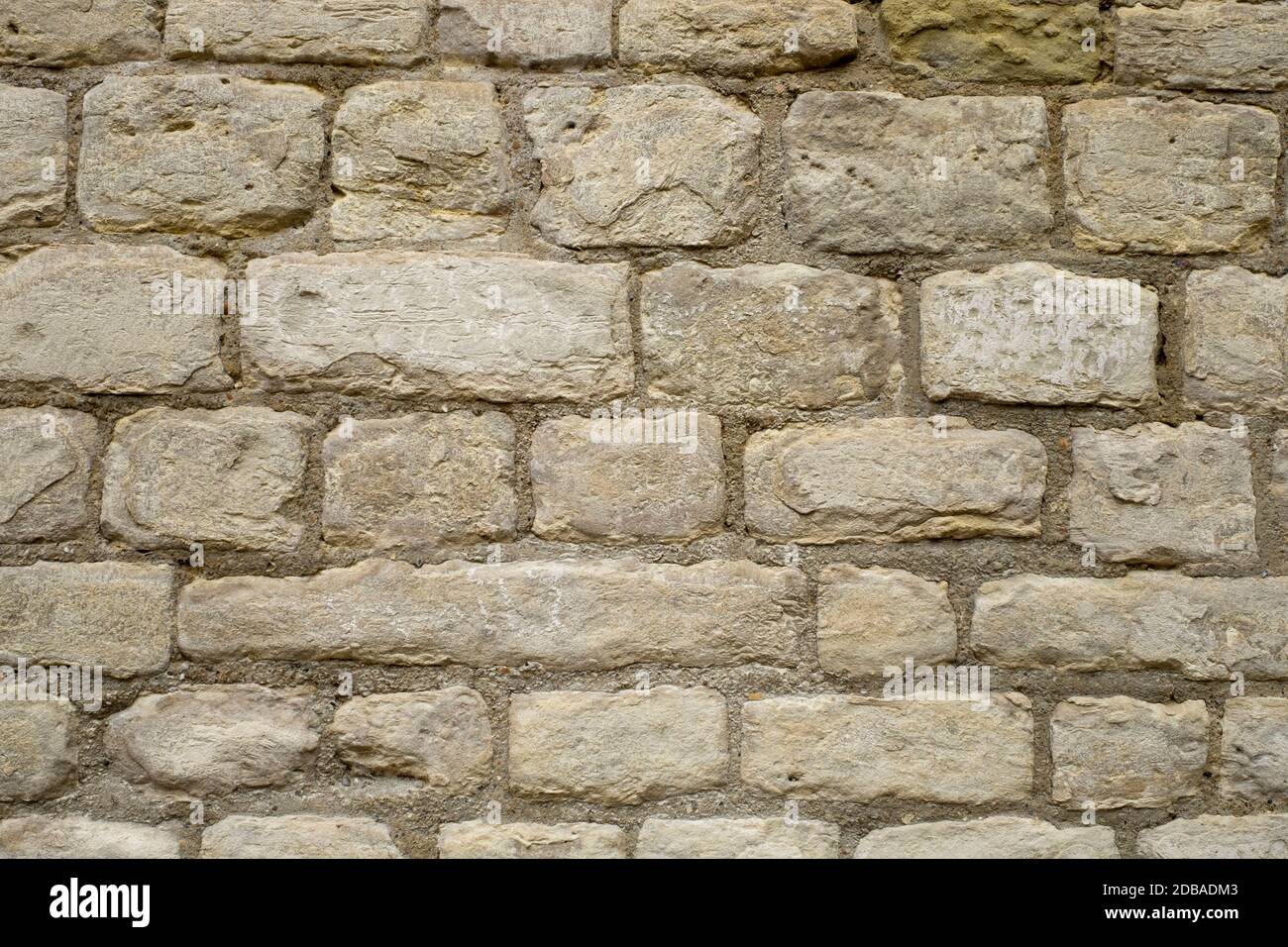 Old stone wall with cement and stones Stock Photo - Alamy