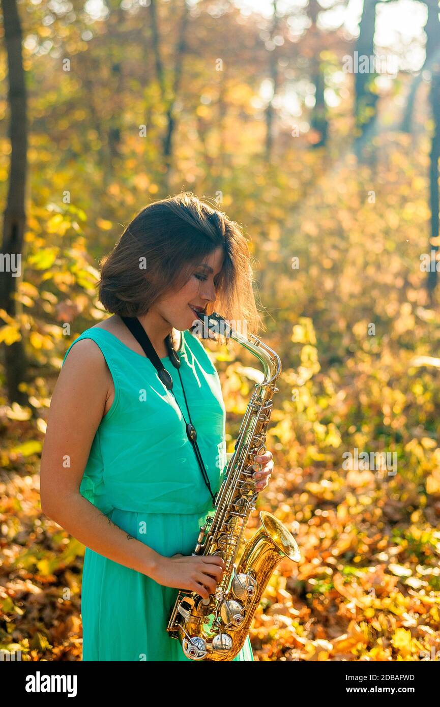 Teenager saxophone hi-res stock photography and images - Alamy