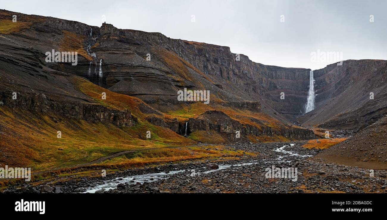 Hengifoss waterfall in eastside of Iceland in a cloudy day Stock Photo ...