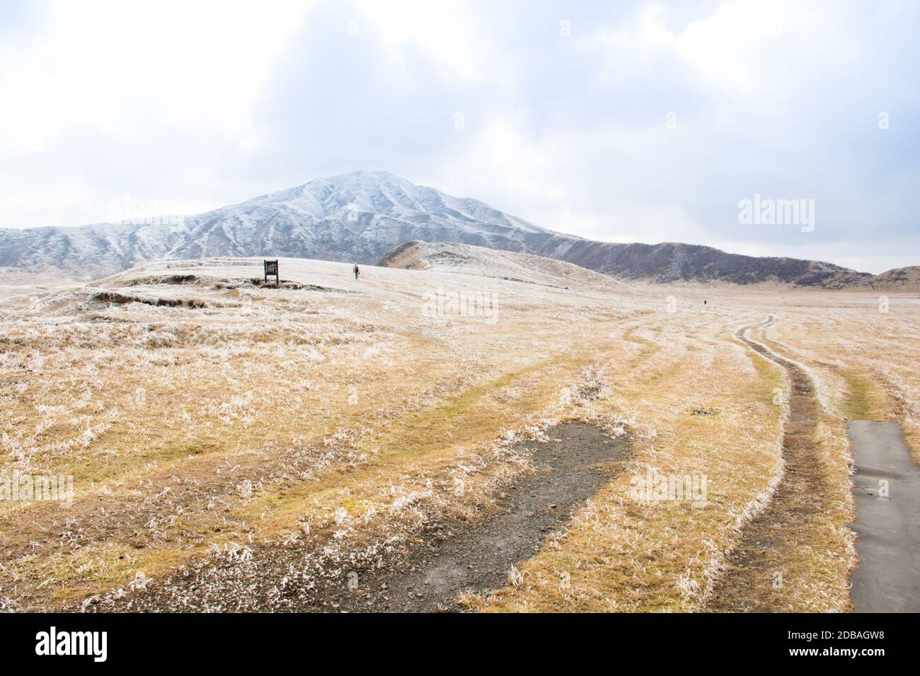 Mount Aso and Kusasenri in winter. covered by golden yellow grassland - Kumamoto, Japan Stock ...