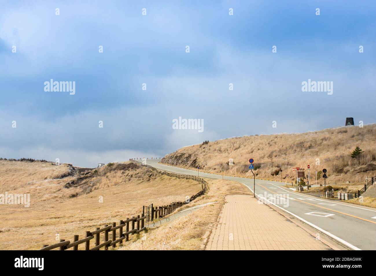 Mount Aso and Kusasenri in winter. covered by golden yellow grassland - Kumamoto, Japan Stock ...