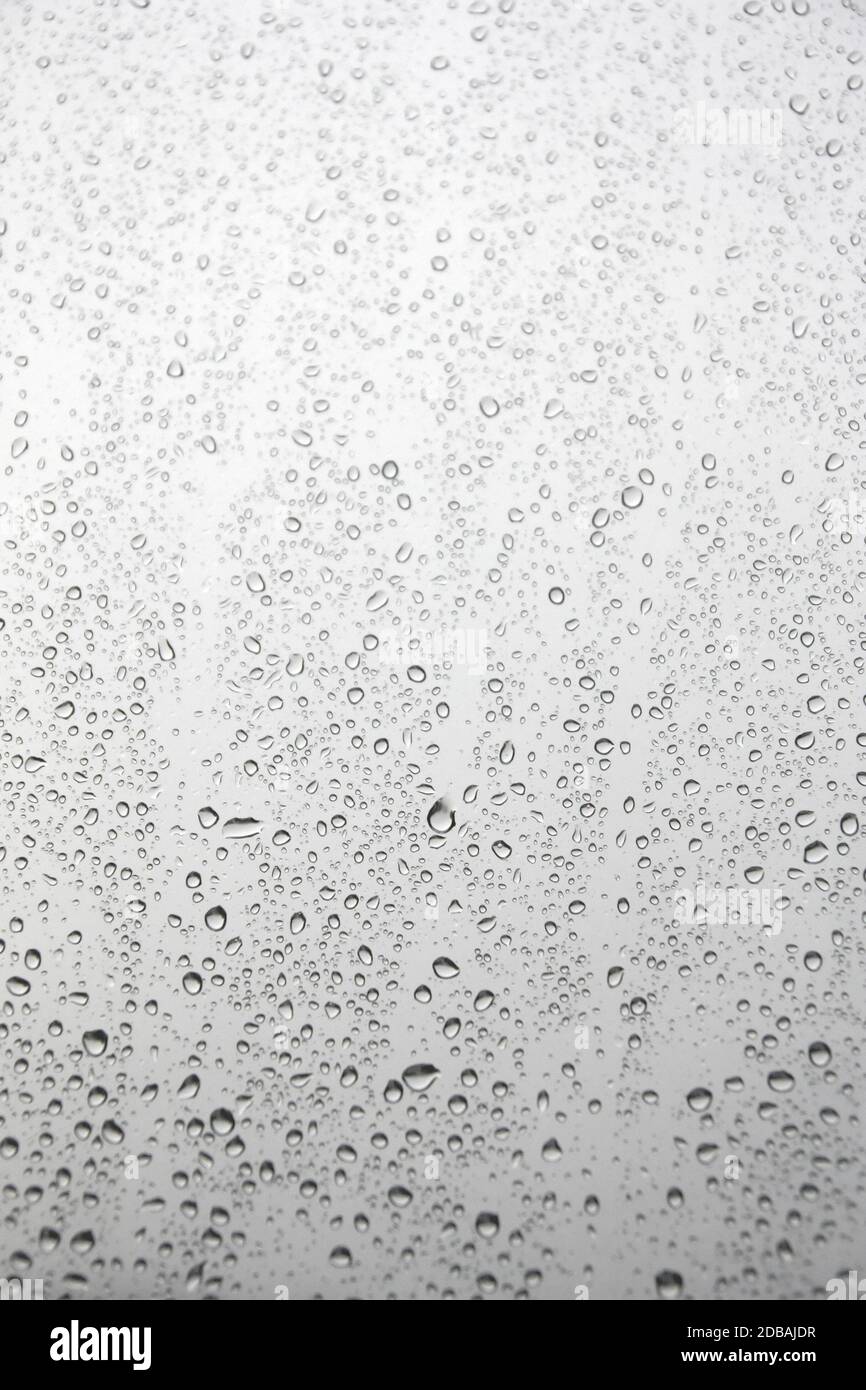 Drops of rain on the inclined window (glass). Shallow DOF Stock Photo ...