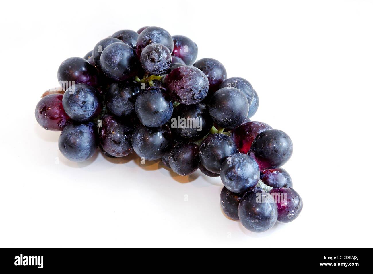 Fresh organic red grapes on white background Stock Photo - Alamy