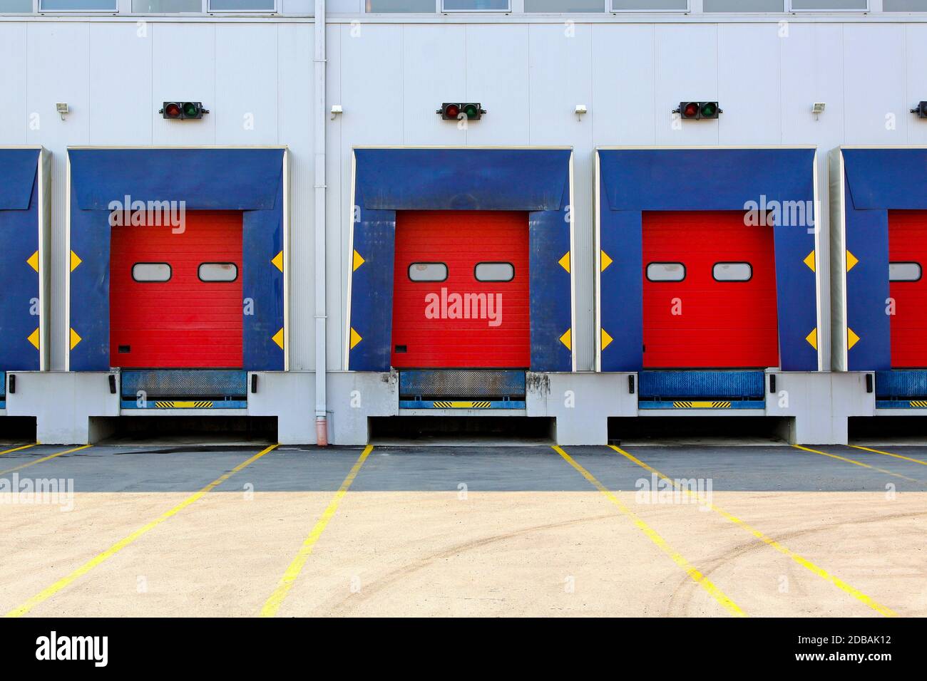 Loading dock cargo doors at big warehouse Stock Photo - Alamy