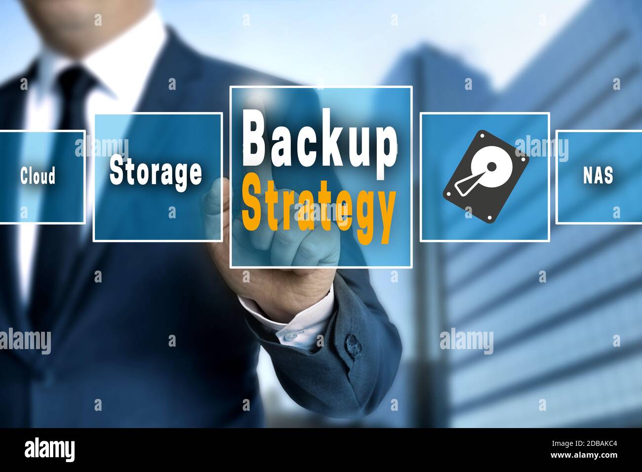 Backup Strategy touchscreen is operated by a businessman Stock Photo ...