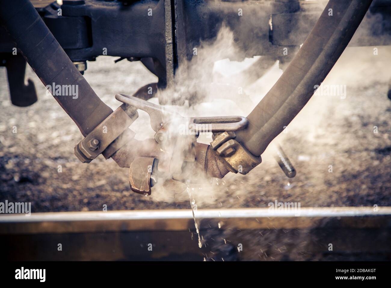 Very hot steam comes out of a pipe from an old steam railway Stock ...