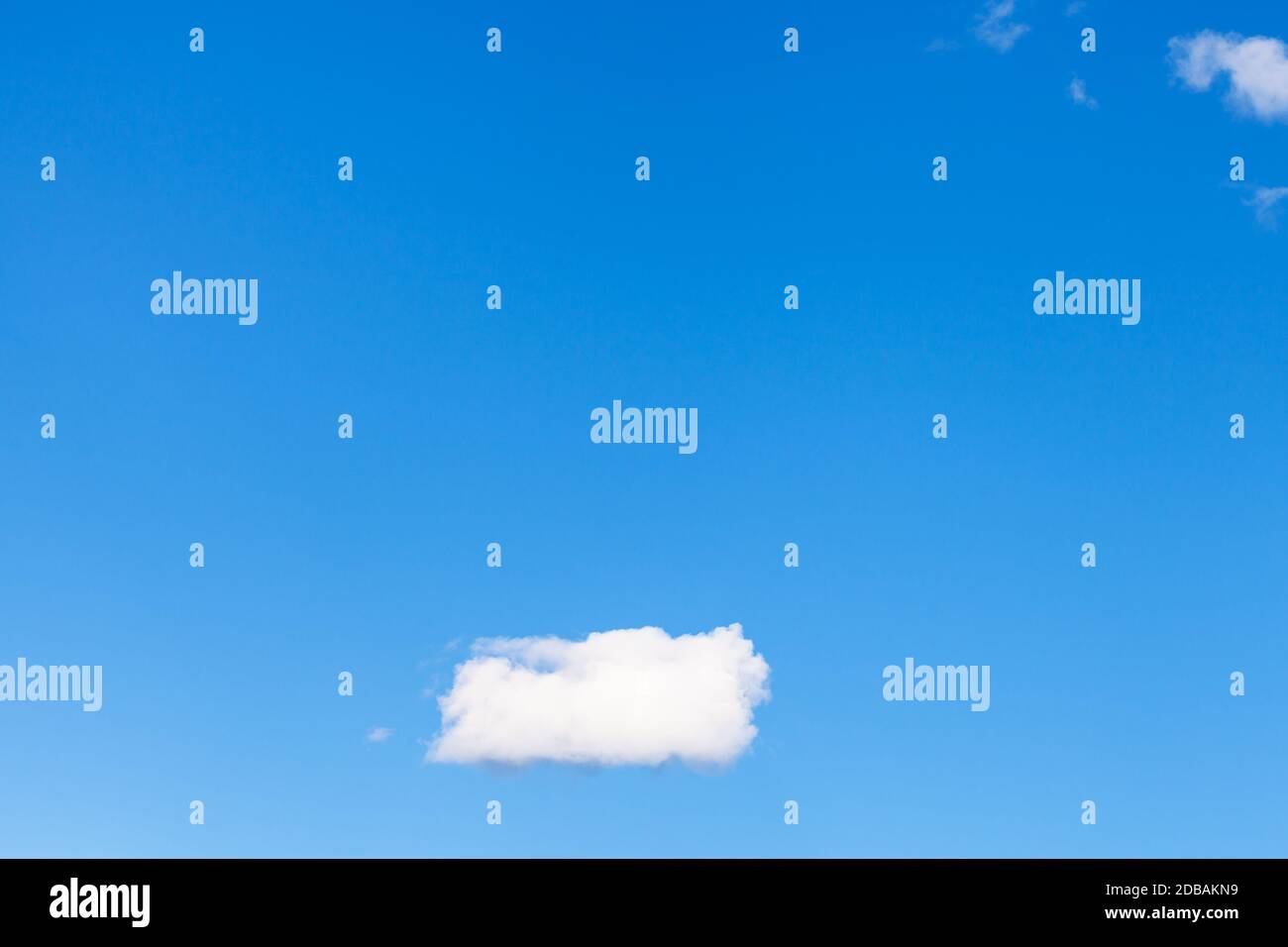 lonely little cloud in blue sky on sunny March day Stock Photo - Alamy