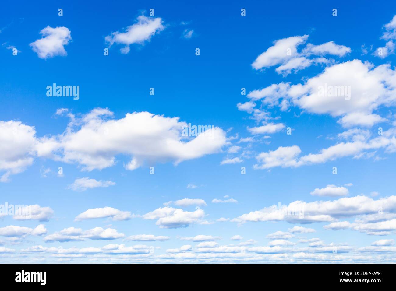 blue sky with many white small cumulus clouds on sunny March day Stock ...