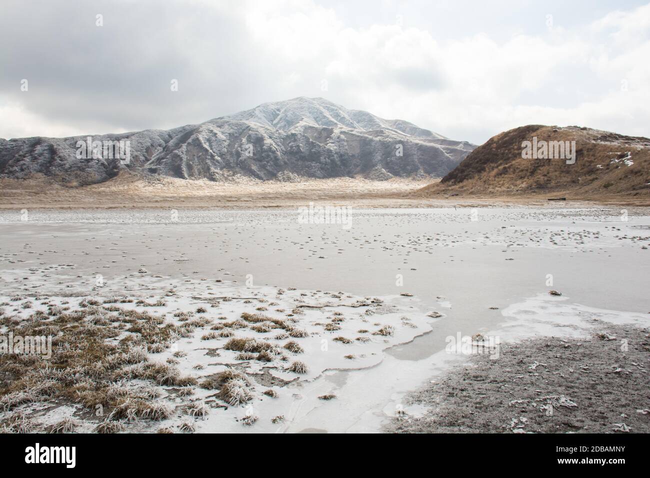 Mount Aso and Kusasenri in winter. covered by golden yellow grassland - Kumamoto, Japan Stock ...