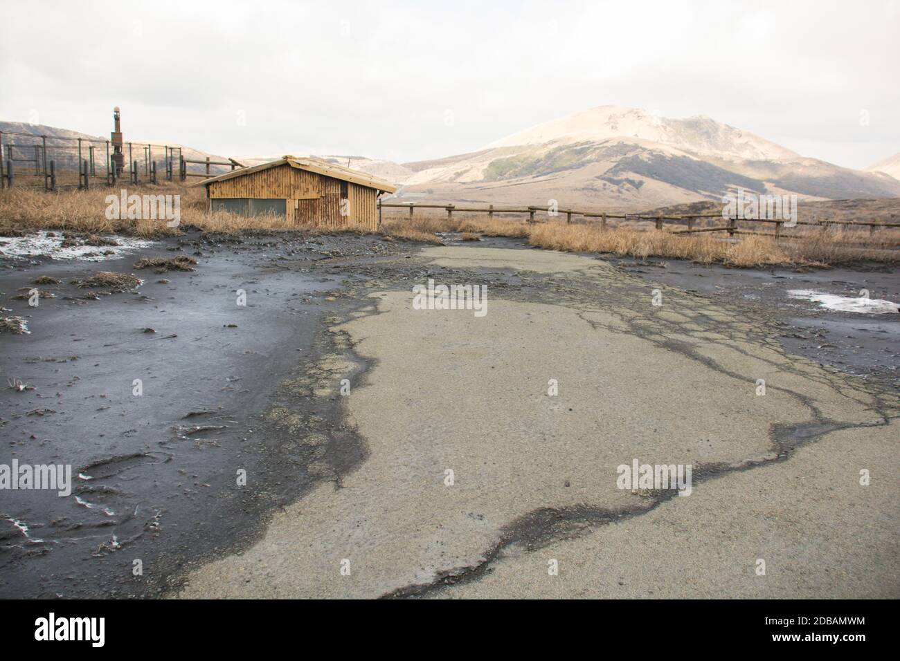 Mount Aso and Kusasenri in winter. covered by golden yellow grassland - Kumamoto, Japan Stock ...