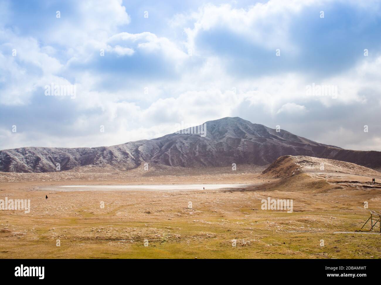 Mount Aso and Kusasenri in winter. covered by golden yellow grassland - Kumamoto, Japan Stock ...