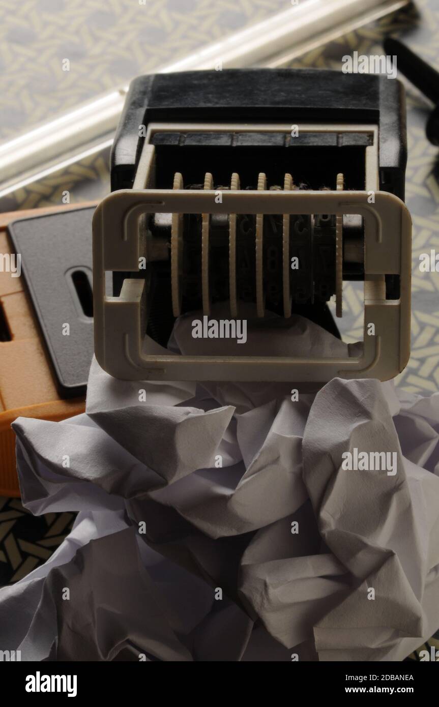 Rubber stamp on waste paper Stock Photo - Alamy