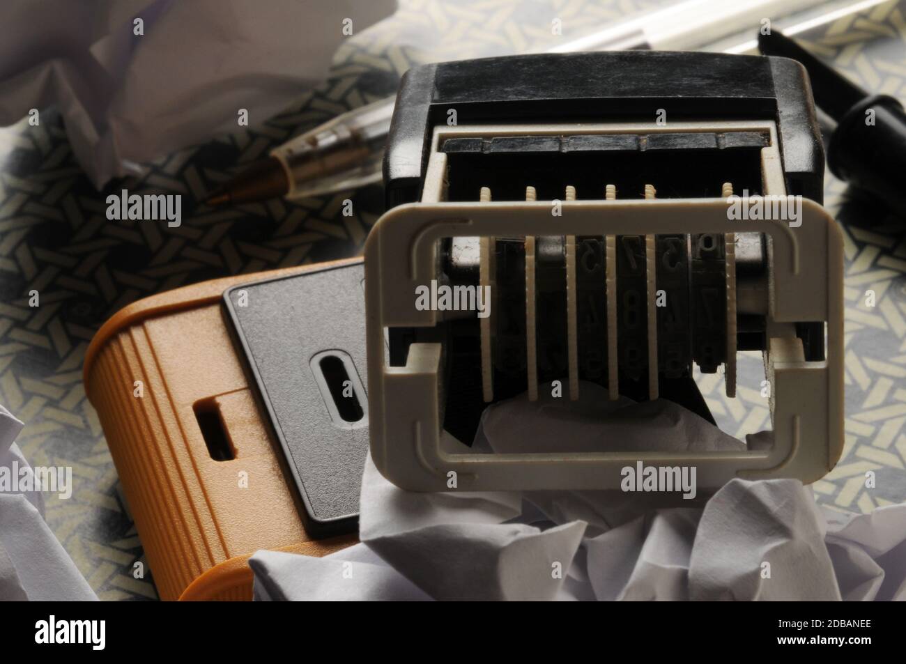 Rubber stamp on waste paper Stock Photo - Alamy