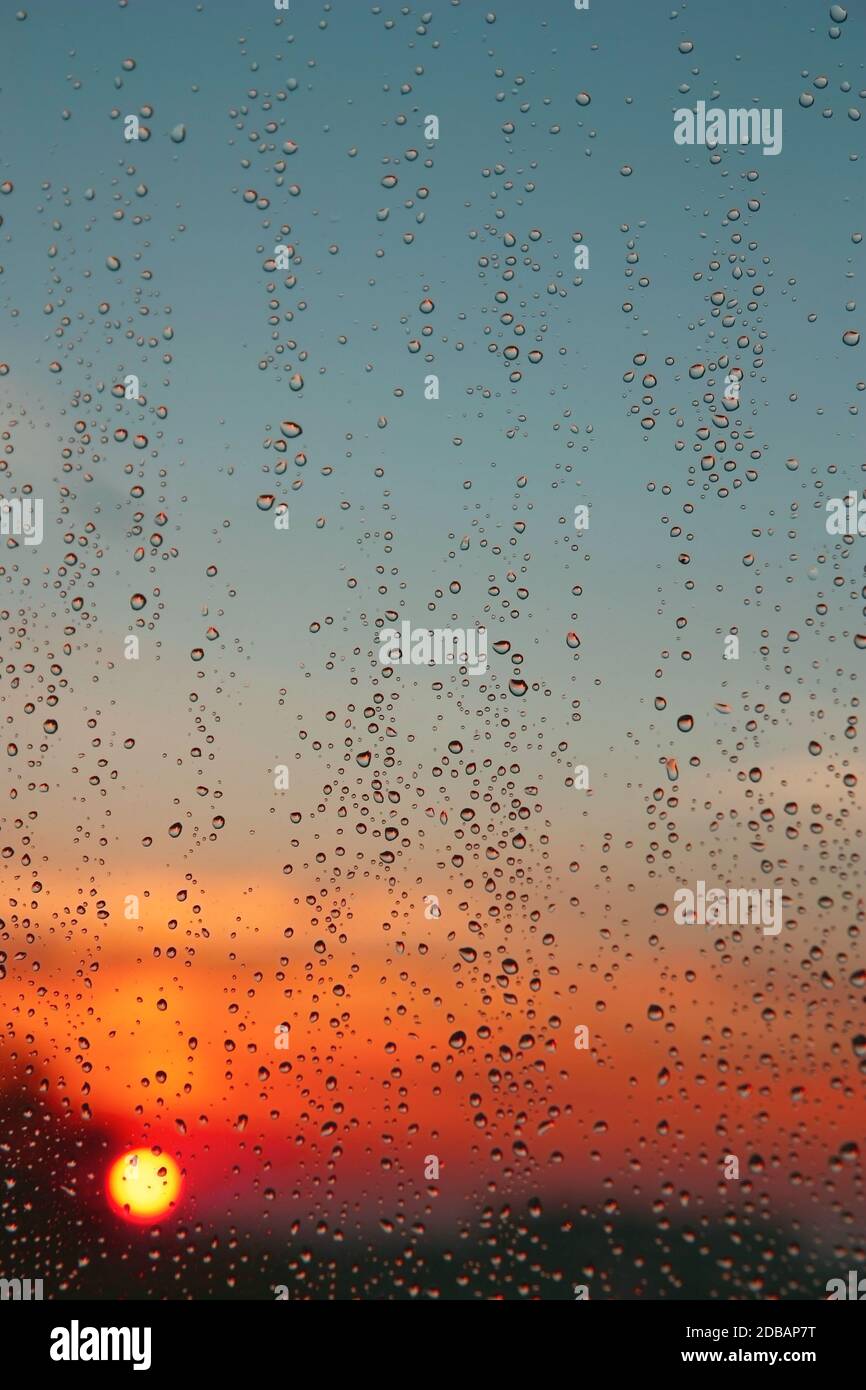Drops of rain on the inclined window (glass). Shallow DOF Stock Photo ...